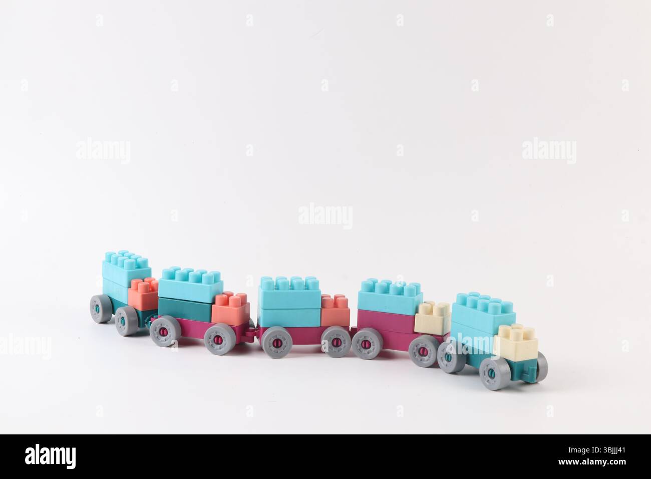 Toy train bricks isolated in white background Stock Photo - Alamy