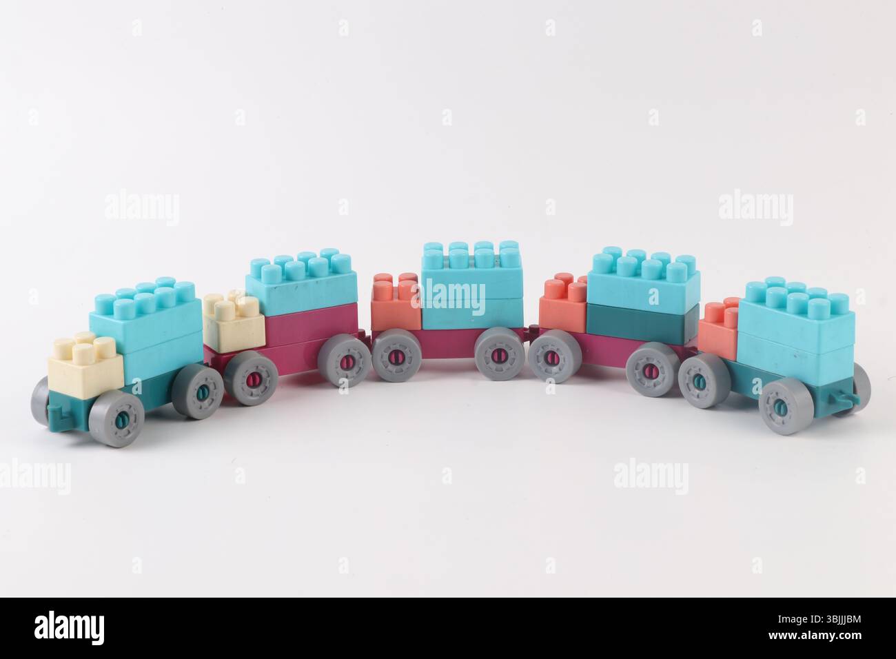Toy train bricks isolated in white background Stock Photo - Alamy