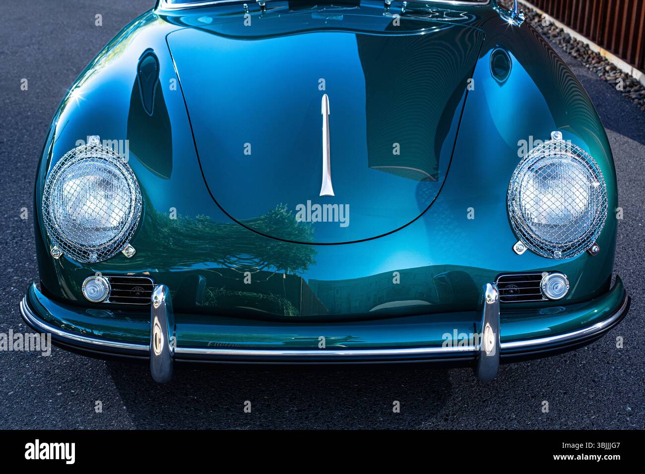 Front end view of a vintage blue green Porsche Stock Photo - Alamy