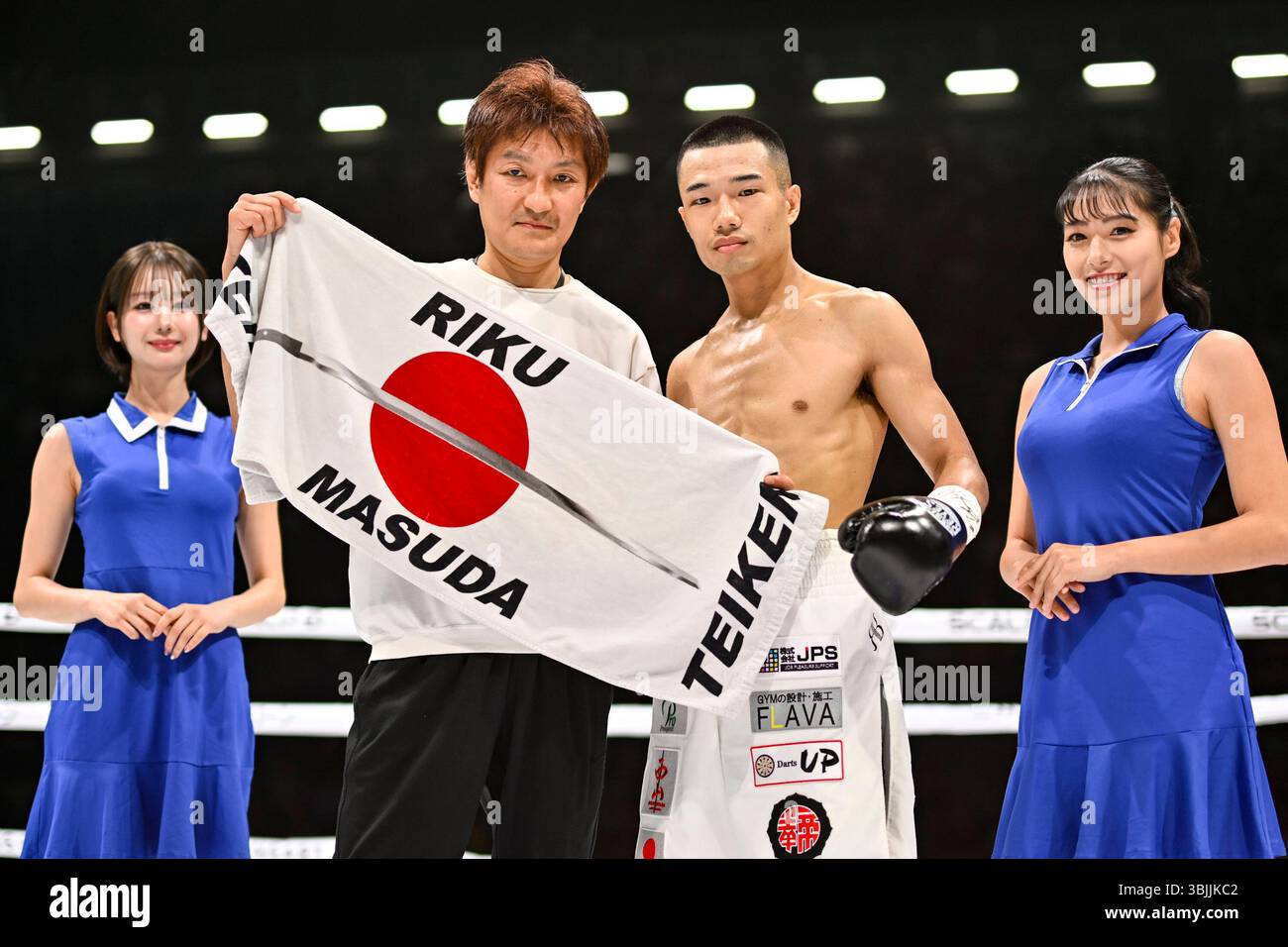 Tokyo, Japan. 8th June, 2025. Japan's Riku Masuda, right, poses with trainer Shin Yamato after ...