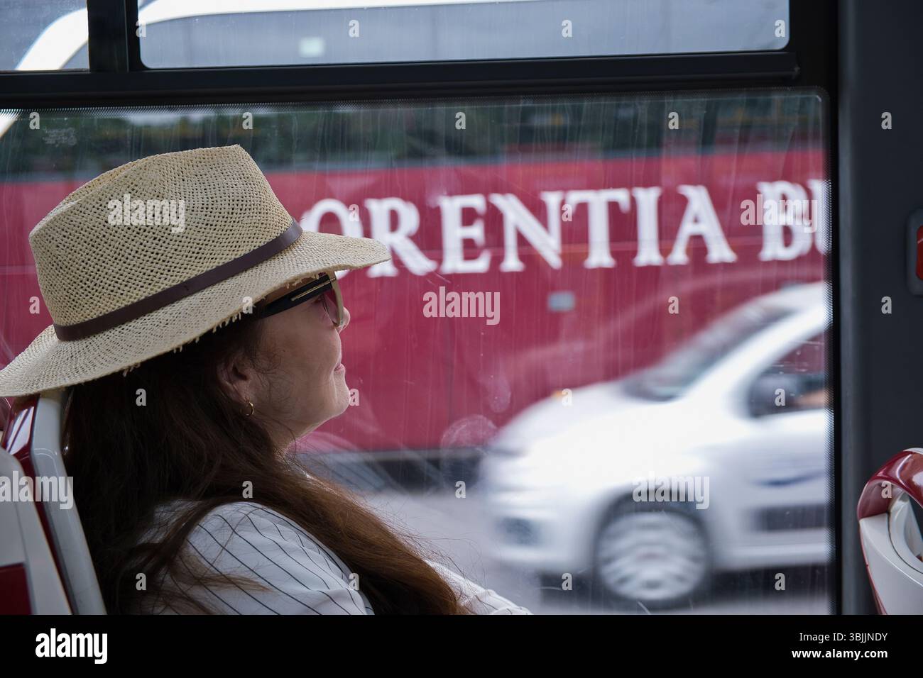 Long dark hair female tourist hi-res stock photography and images - Alamy