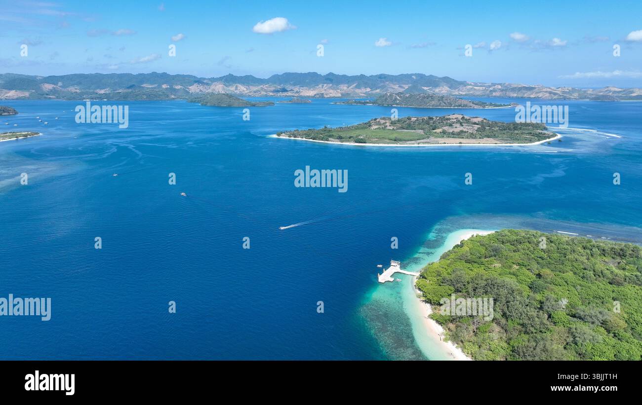 A stunning panorama of emerald islands and deep blue sea under a clear ...