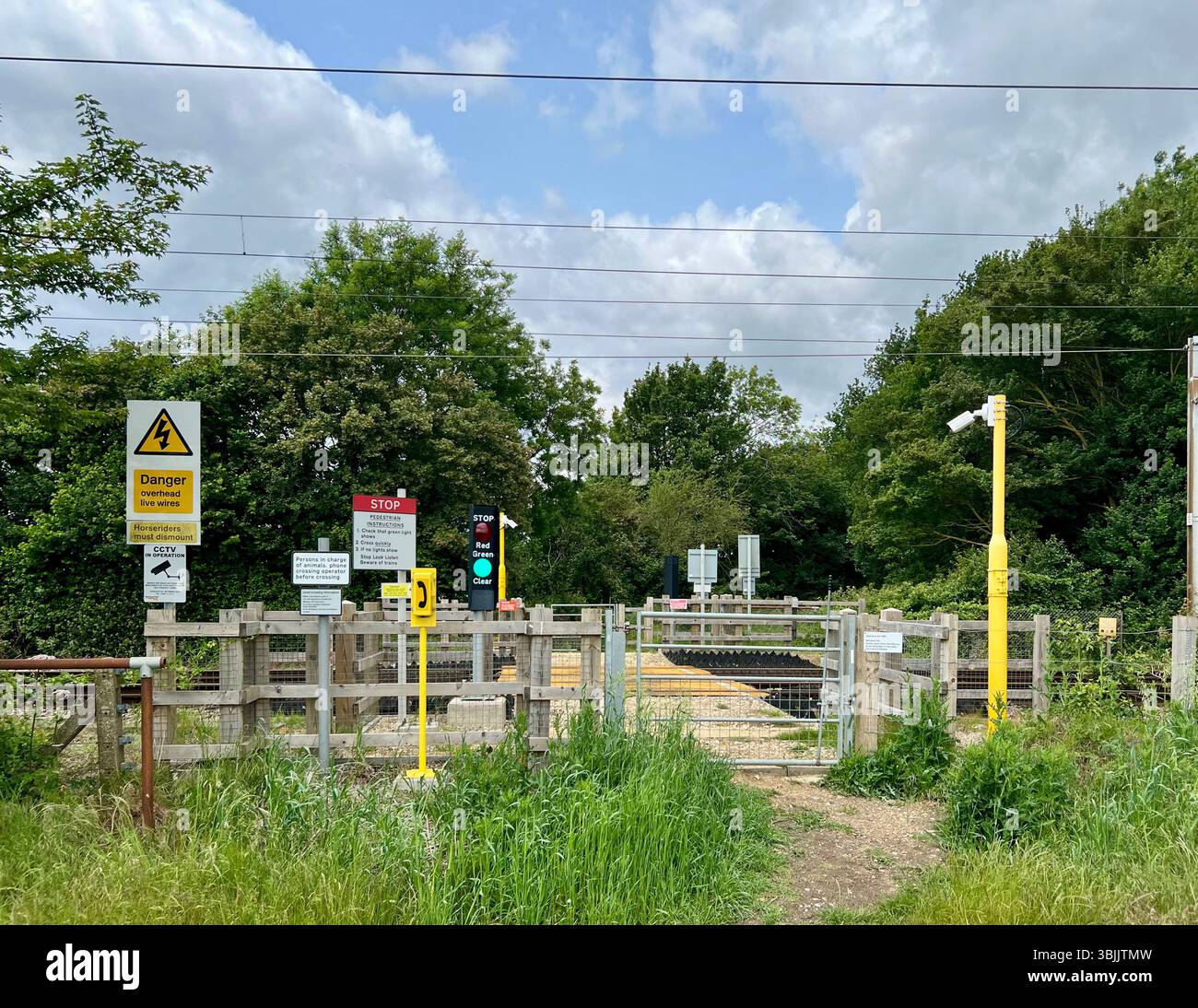A gated pedestrian and horse rider railway crossing at Thornham Magna ...