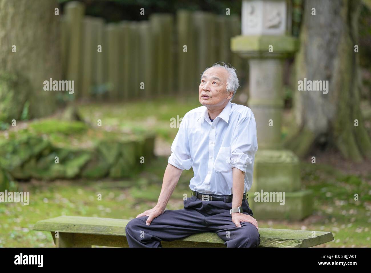 In rural Japan, a Japanese man in his late 70s takes a quiet rest at a ...