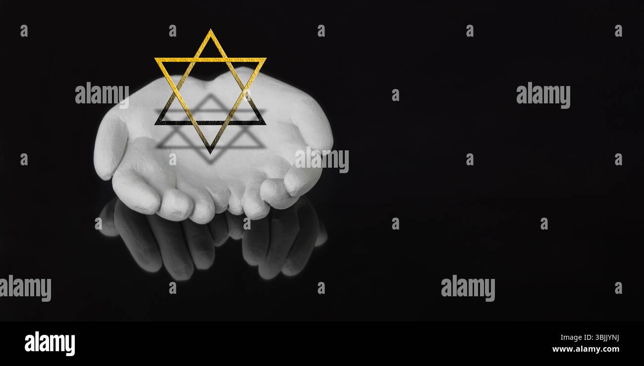 Hands gipsum and holding or showing the Star of David. Holocaust ...