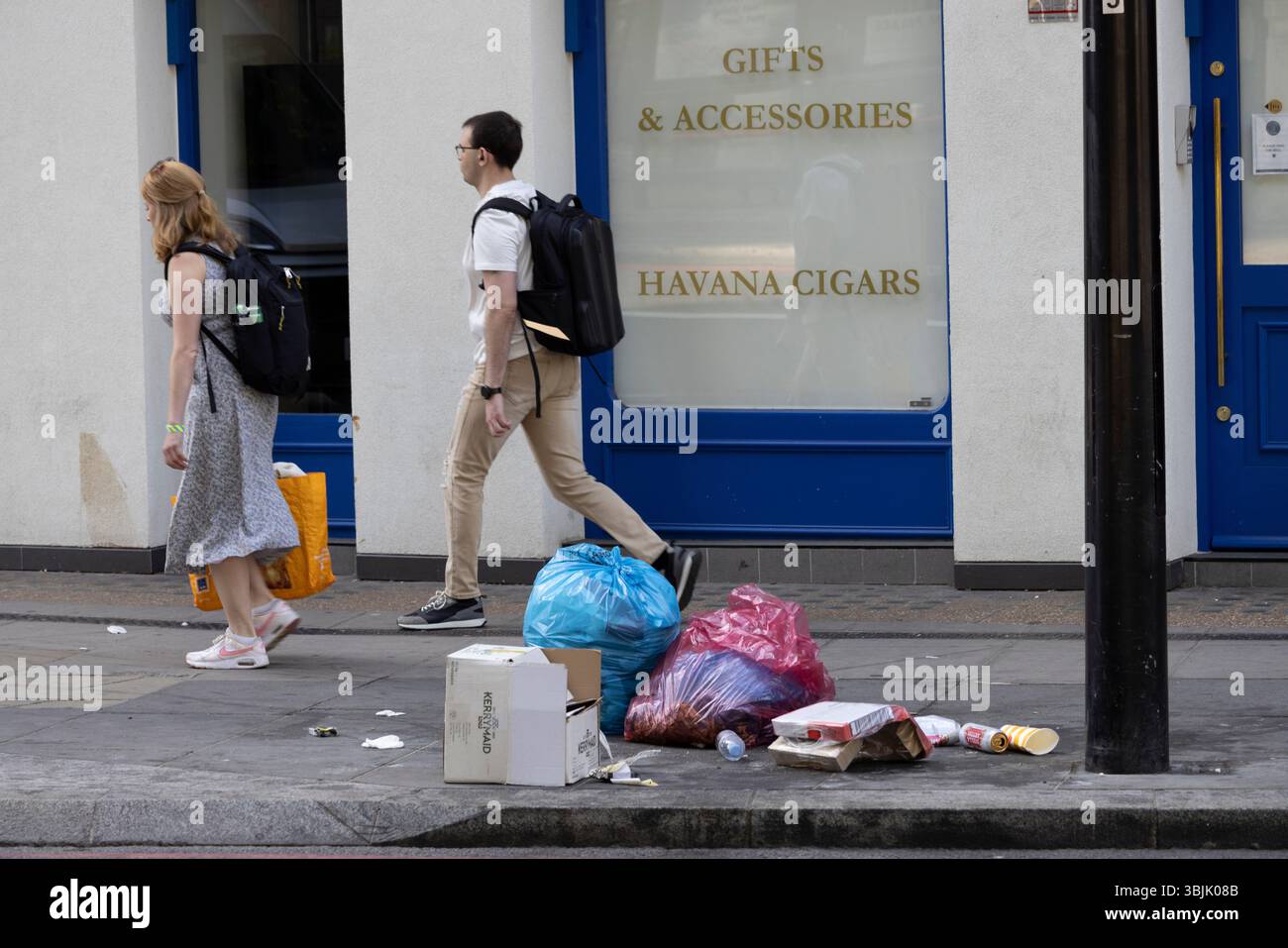 Homeless people rough sleeping on the streets of London, in the City of ...