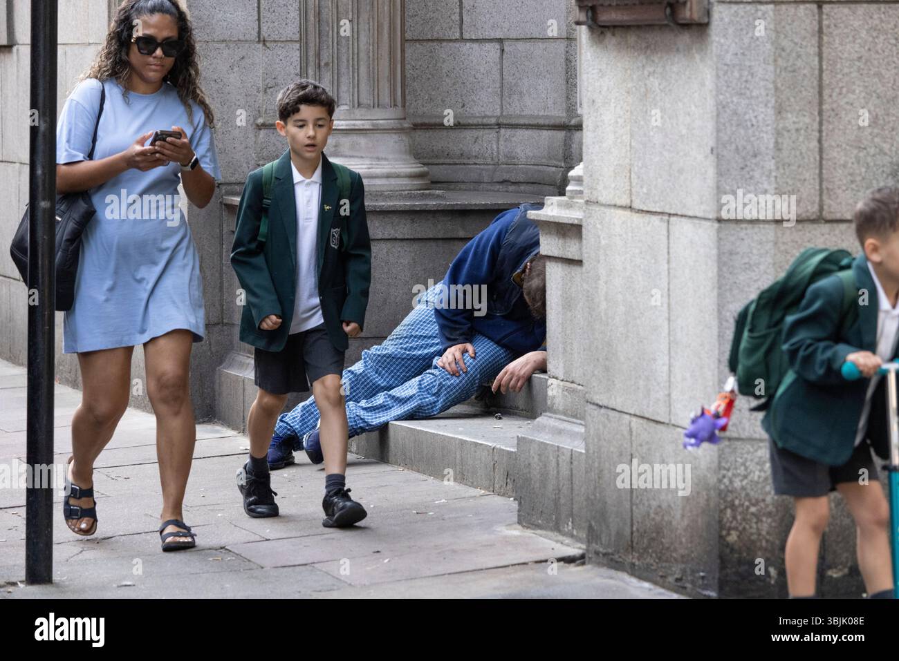 Homeless people rough sleeping on the streets of London, in the City of ...