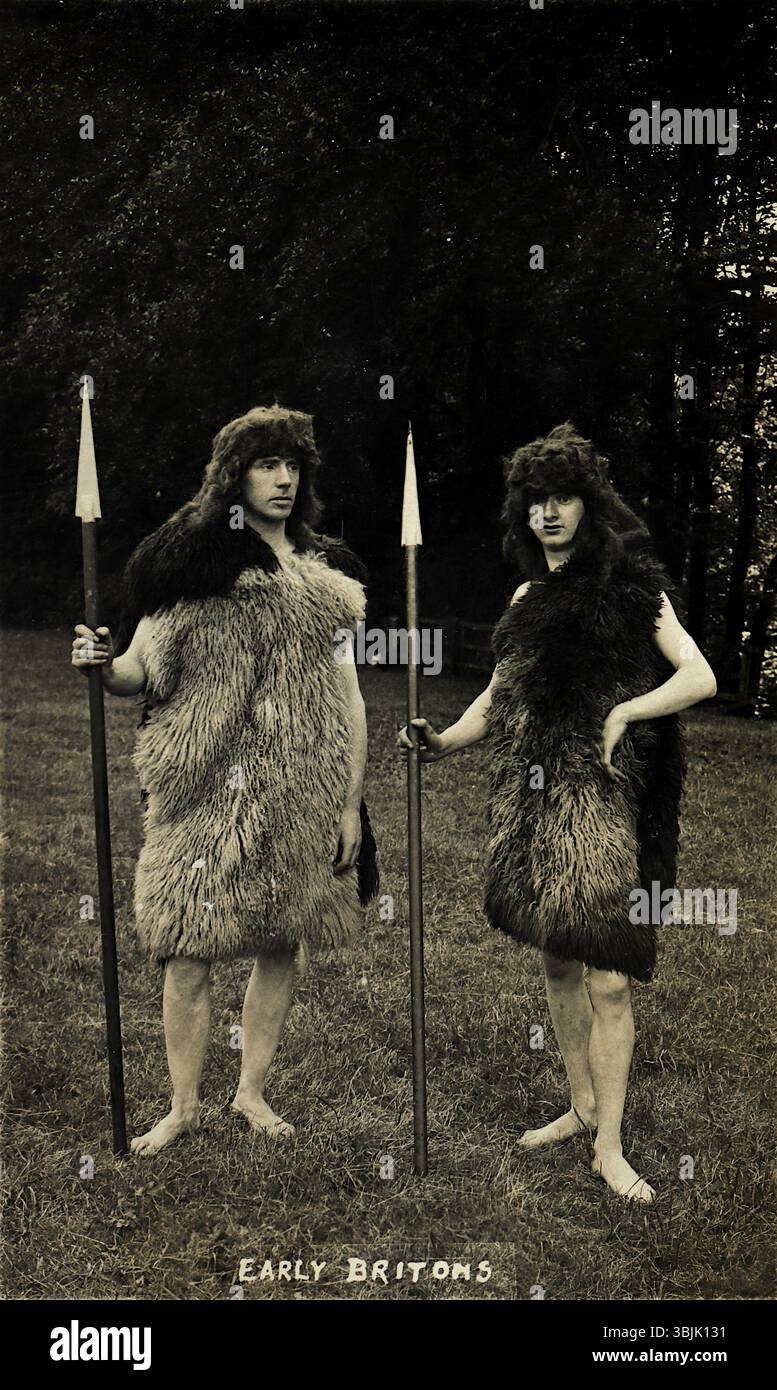 Early Britons: A re-enactment with two men holding spears and dressed ...