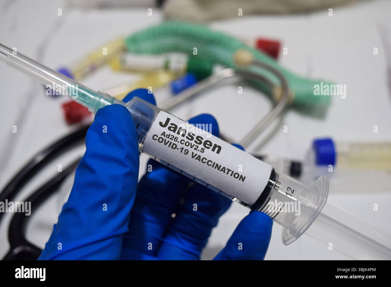 Janssen ad26.COV2.S covid-19 vaccination drug syringe in blue gloved ...