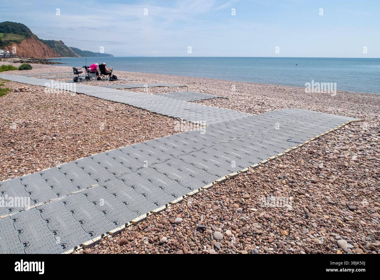 Mobility scooter beach access hi-res stock photography and images - Alamy