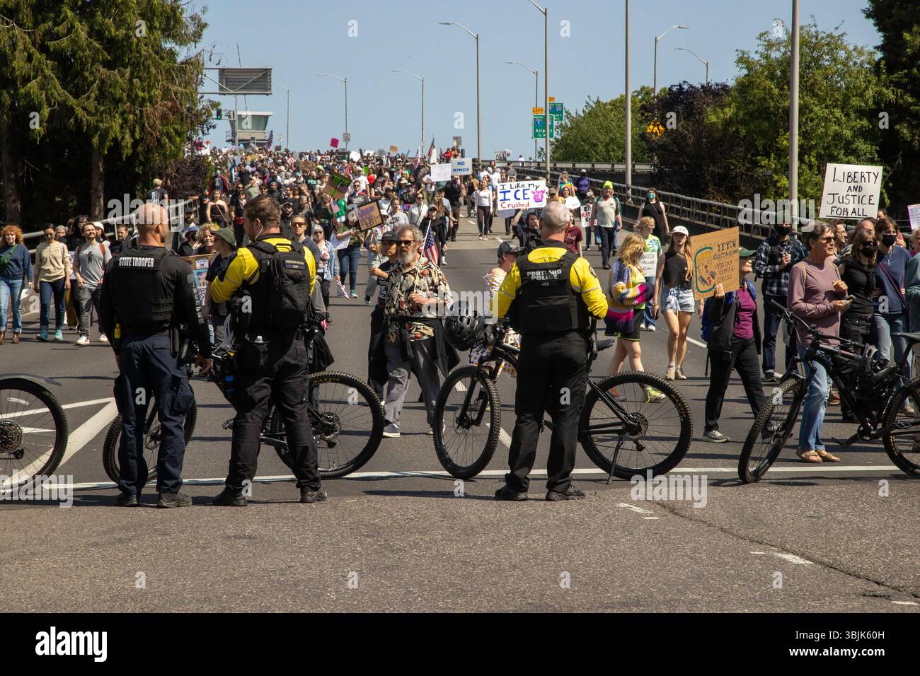 Portland, Oregon, USA. 14th June, 2025. Police at the base of the ...