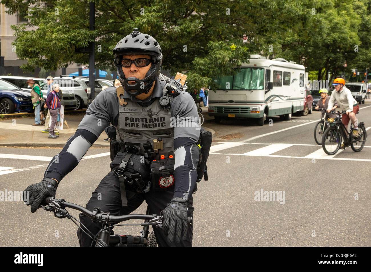Portland Firefighters Bike Medic peacefully monitor the No Kings ...