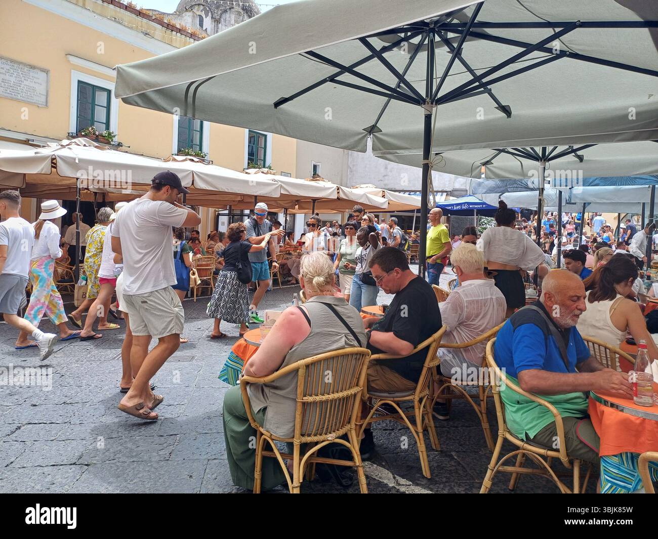 Italy, Capri. Tourists in the main square of island Stock Photo - Alamy