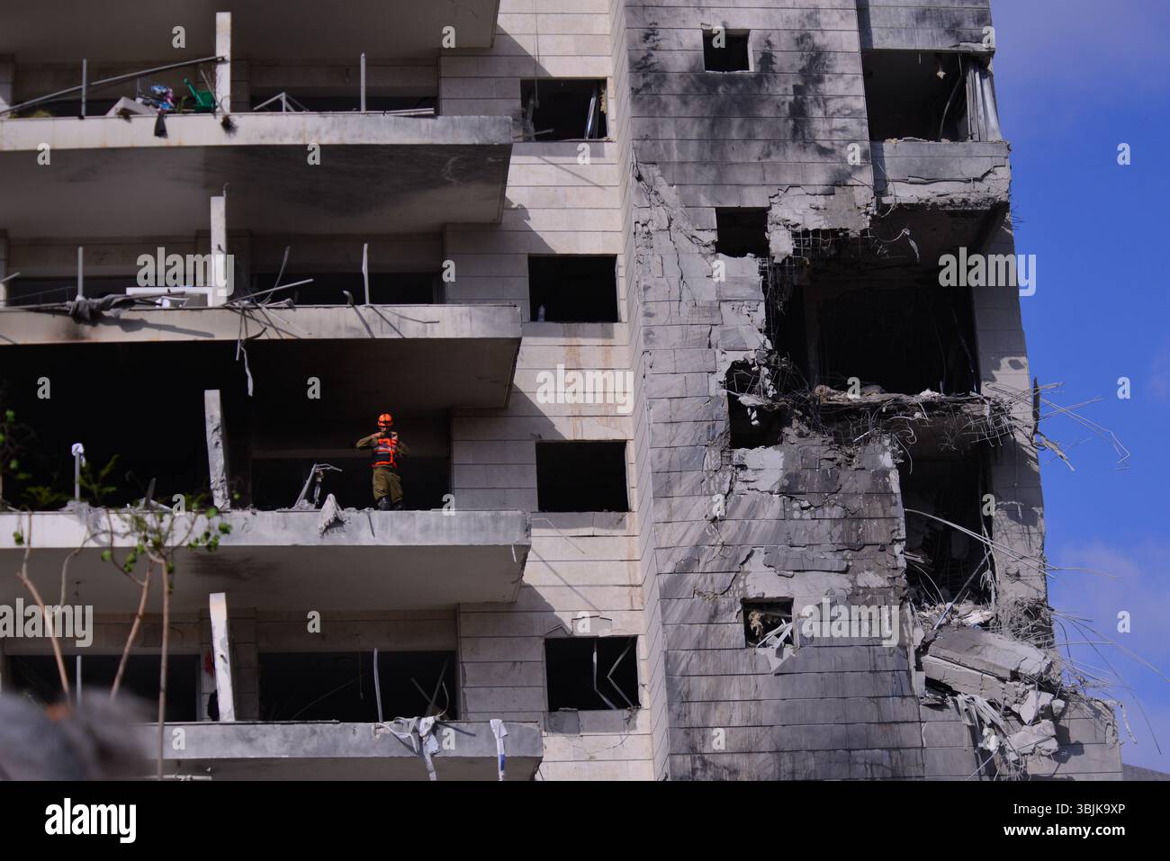 IDF Home Front Command soldier inspect a penetrated shelter in a civil ...