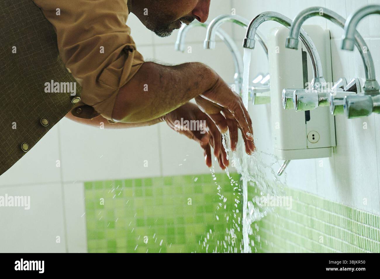 Berlin, Germany. 06th June, 2025. A man washes himself in the mosque ...
