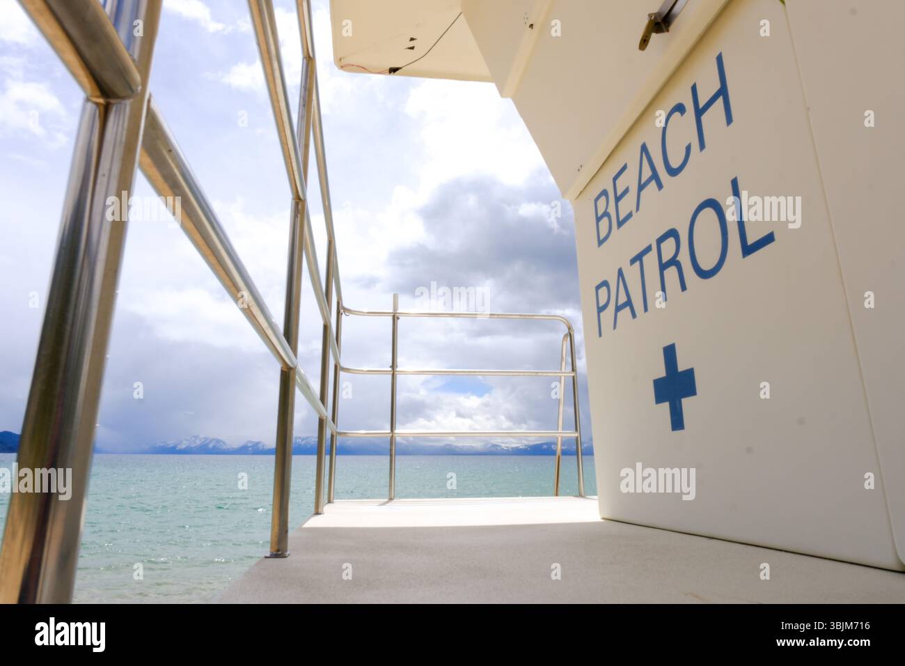 13 MAY 2025 - Tahoe, CA, USA - Beach Patrol lifeguard stand on a sandy ...