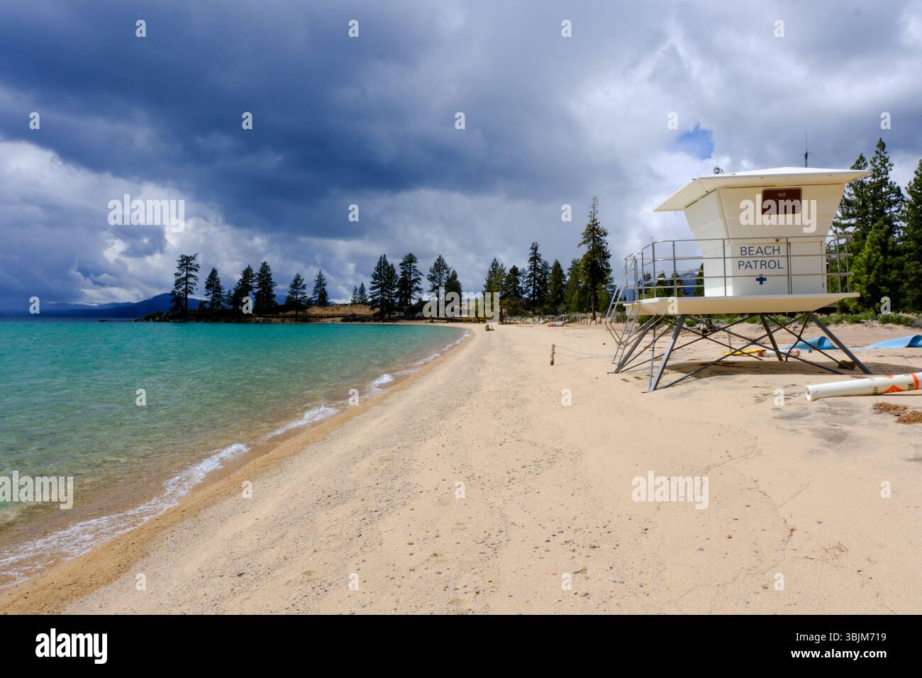 13 MAY 2025 - Tahoe, CA, USA - Beach Patrol lifeguard stand on a sandy ...