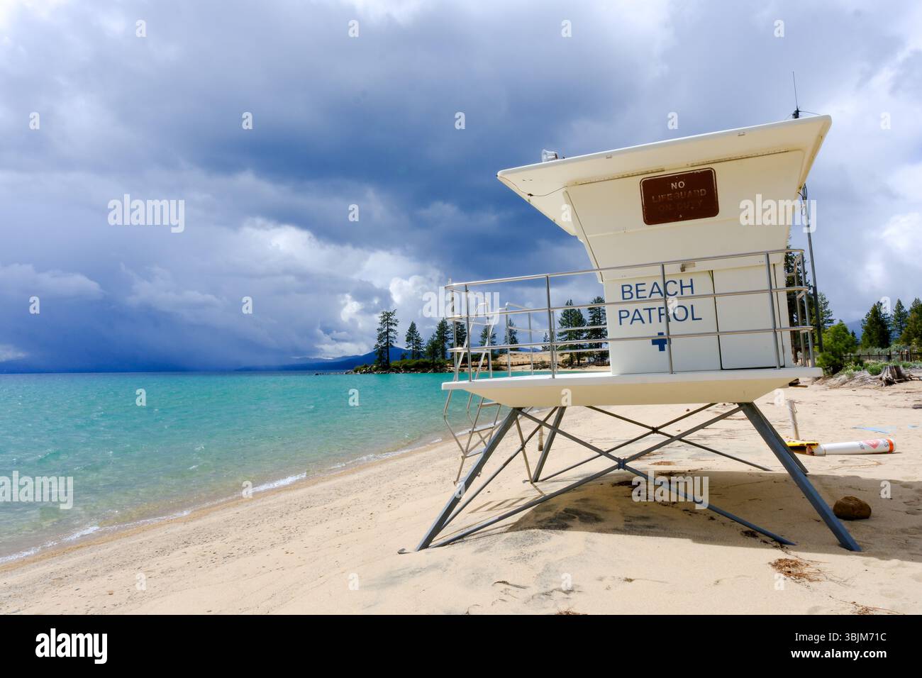 13 MAY 2025 - Tahoe, CA, USA - Beach Patrol lifeguard stand on a sandy ...