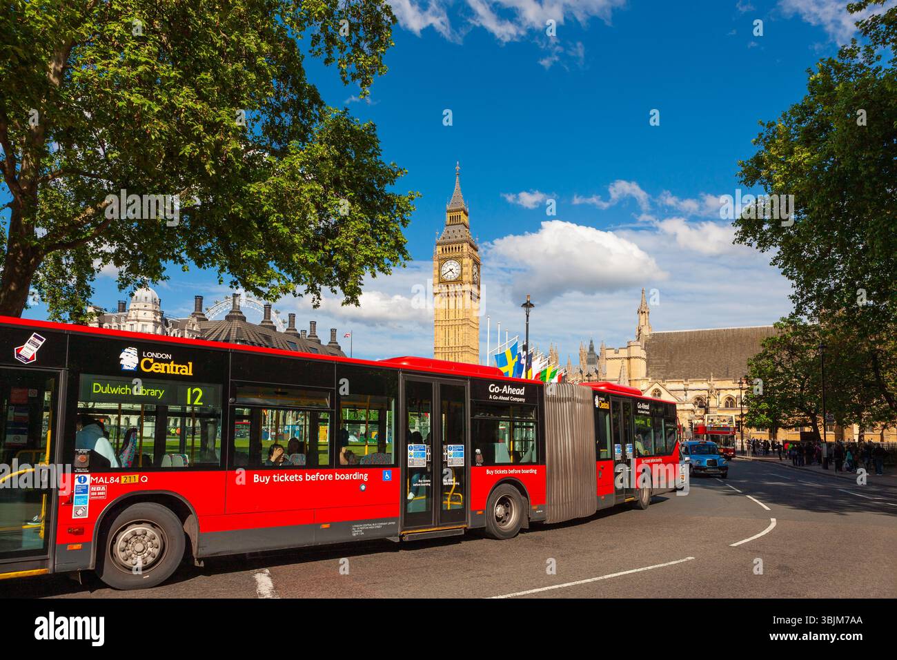 London, United Kingdom - May 9, 2011 : Articulated bus drives around ...