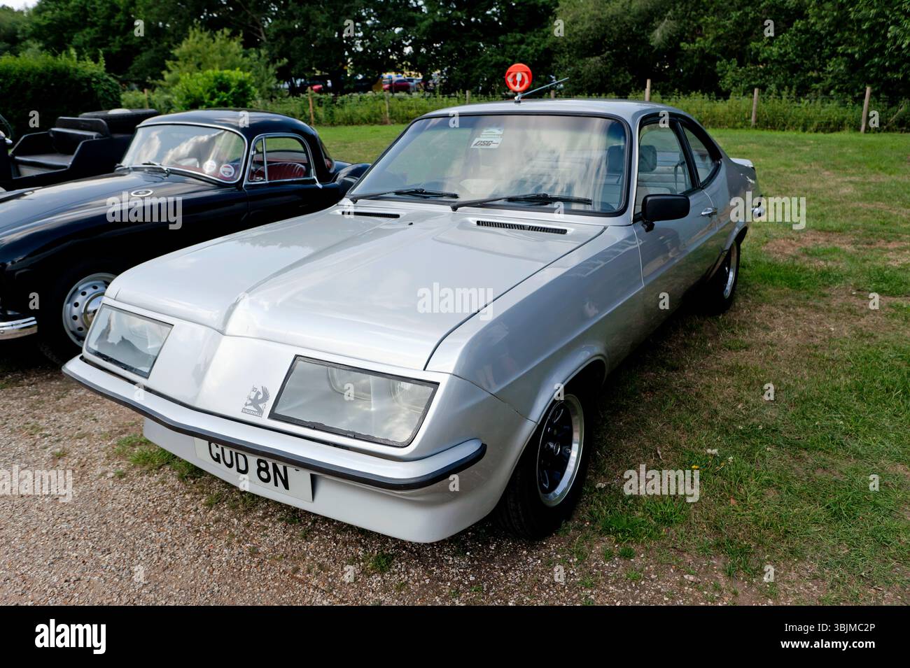 Three-quarters Front View of a 1974, Silver, Vauxhall Chevette HS, on ...