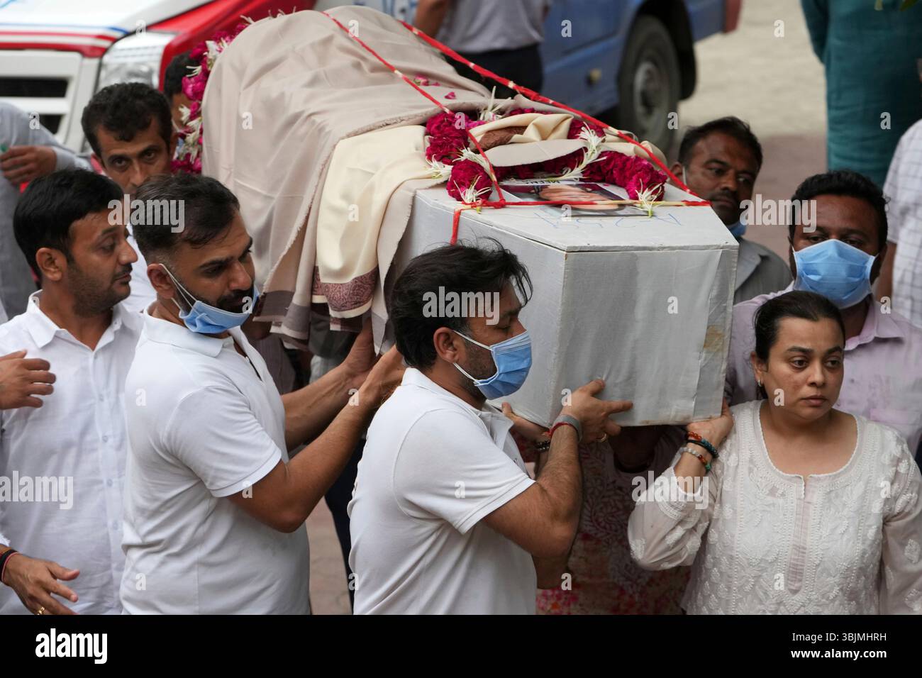 Family members carry coffin of Meena Patel, victim of the Air India ...
