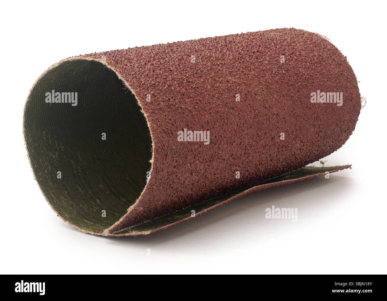 piece of reddish brown sandpaper rolled isolated white background, P40 ...