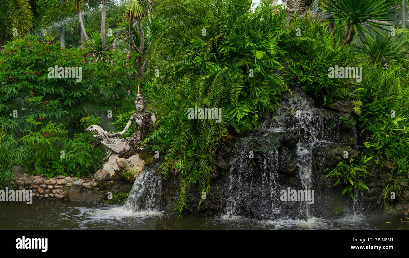 Garden Sculpture and small waterfall at Erawan Museum Stock Photo - Alamy