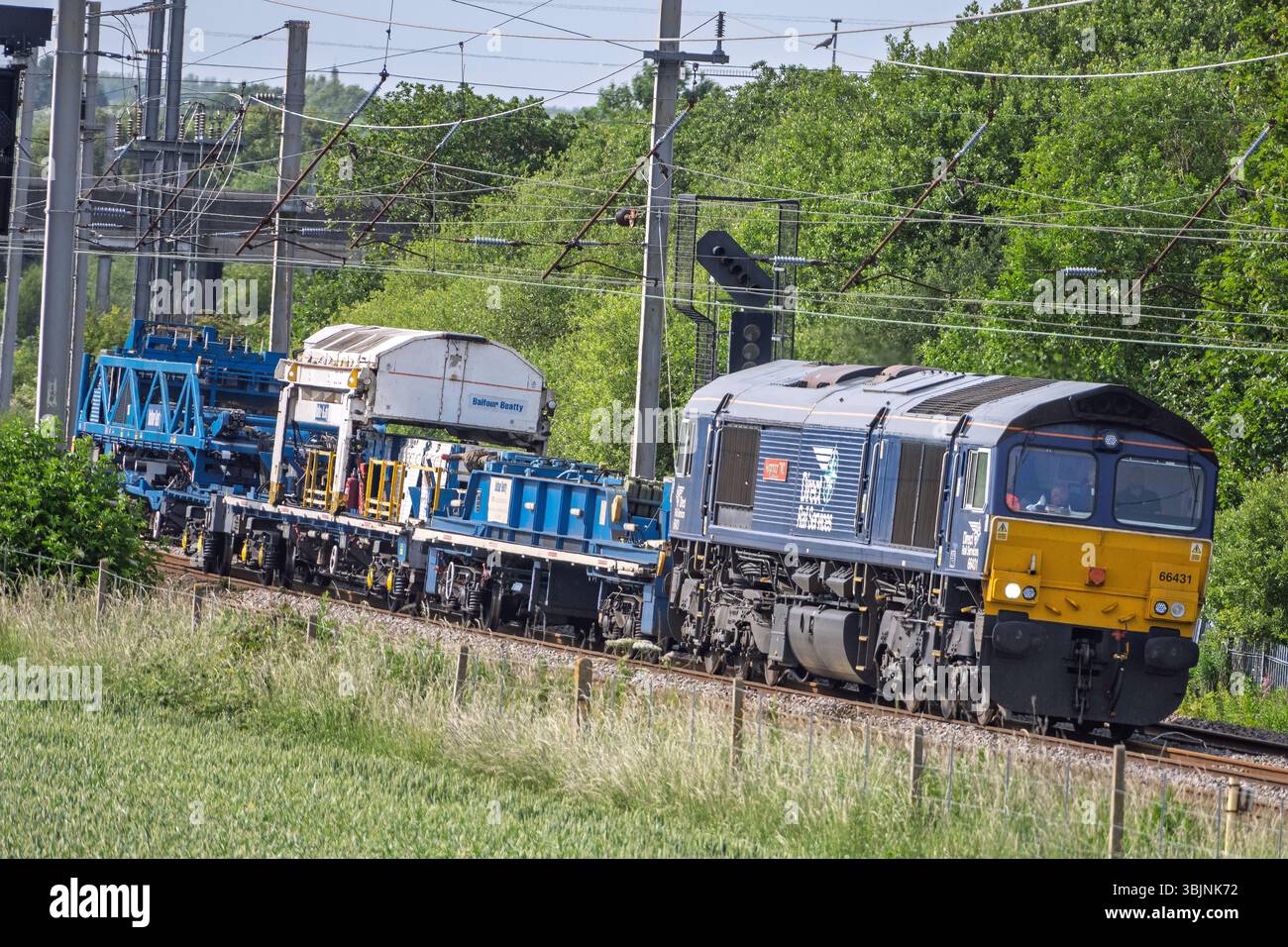 Balfour Beatty track laying mahine Stock Photo - Alamy