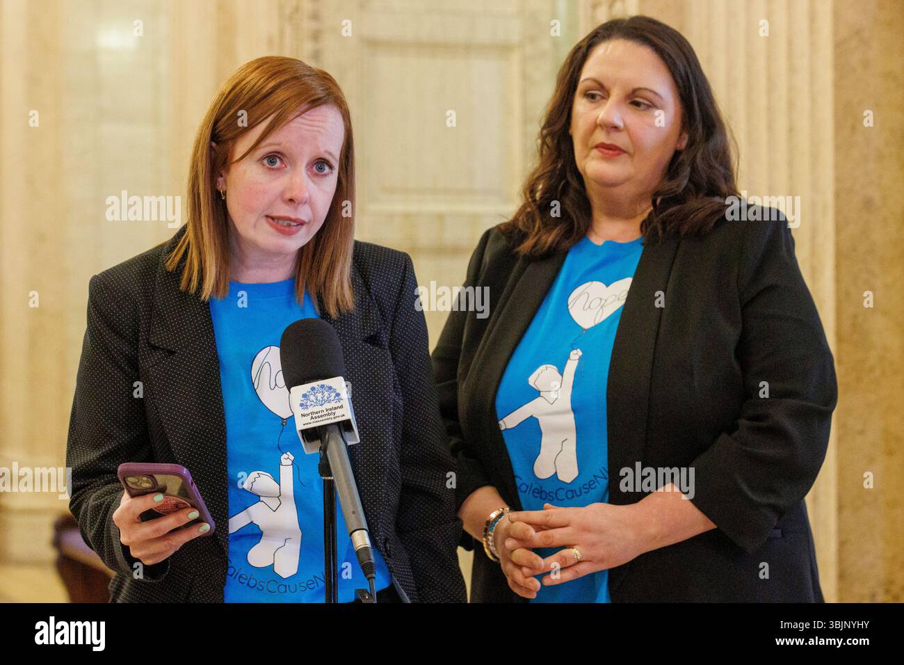 Alma White (left) and Denise Geary from CalebsCauseNI giving reaction at Stormont in Belfast, to ...