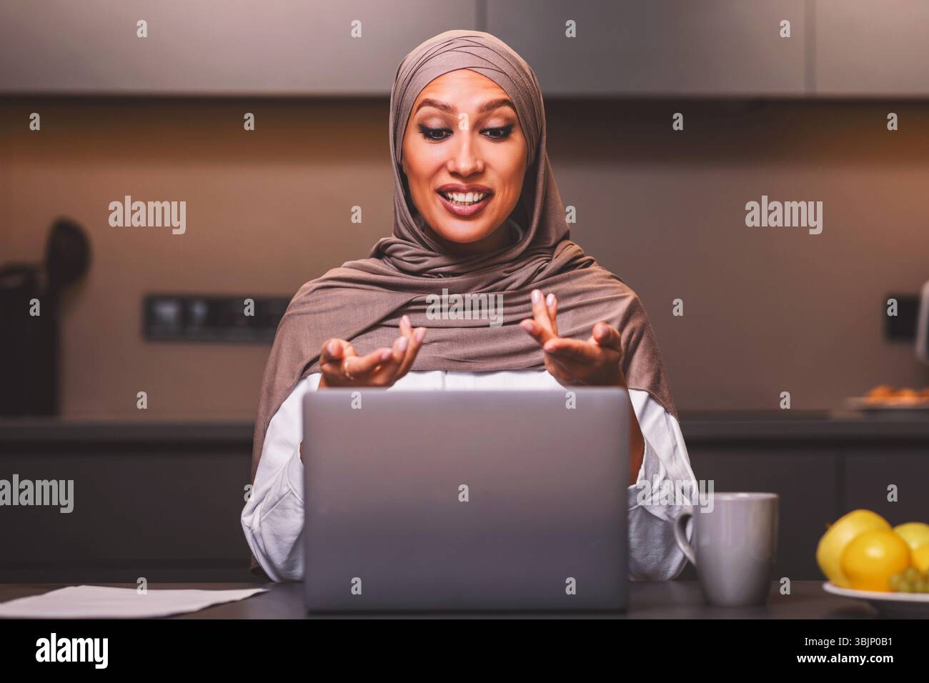 Woman in hijab making video hi-res stock photography and images - Alamy