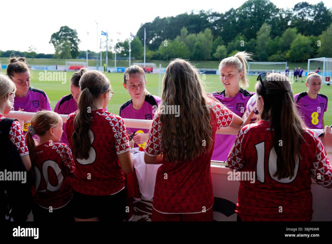 England players sign autographs after a training session at St George's ...
