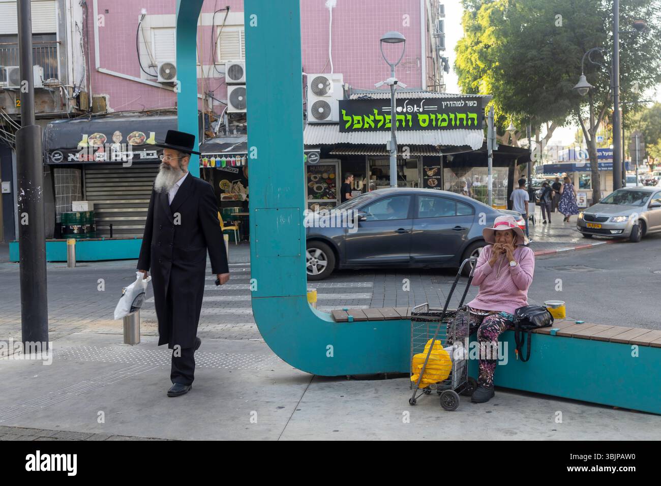 Petah Tikva, Israel, 12 June 2025, Two People On A Street In Petah ...