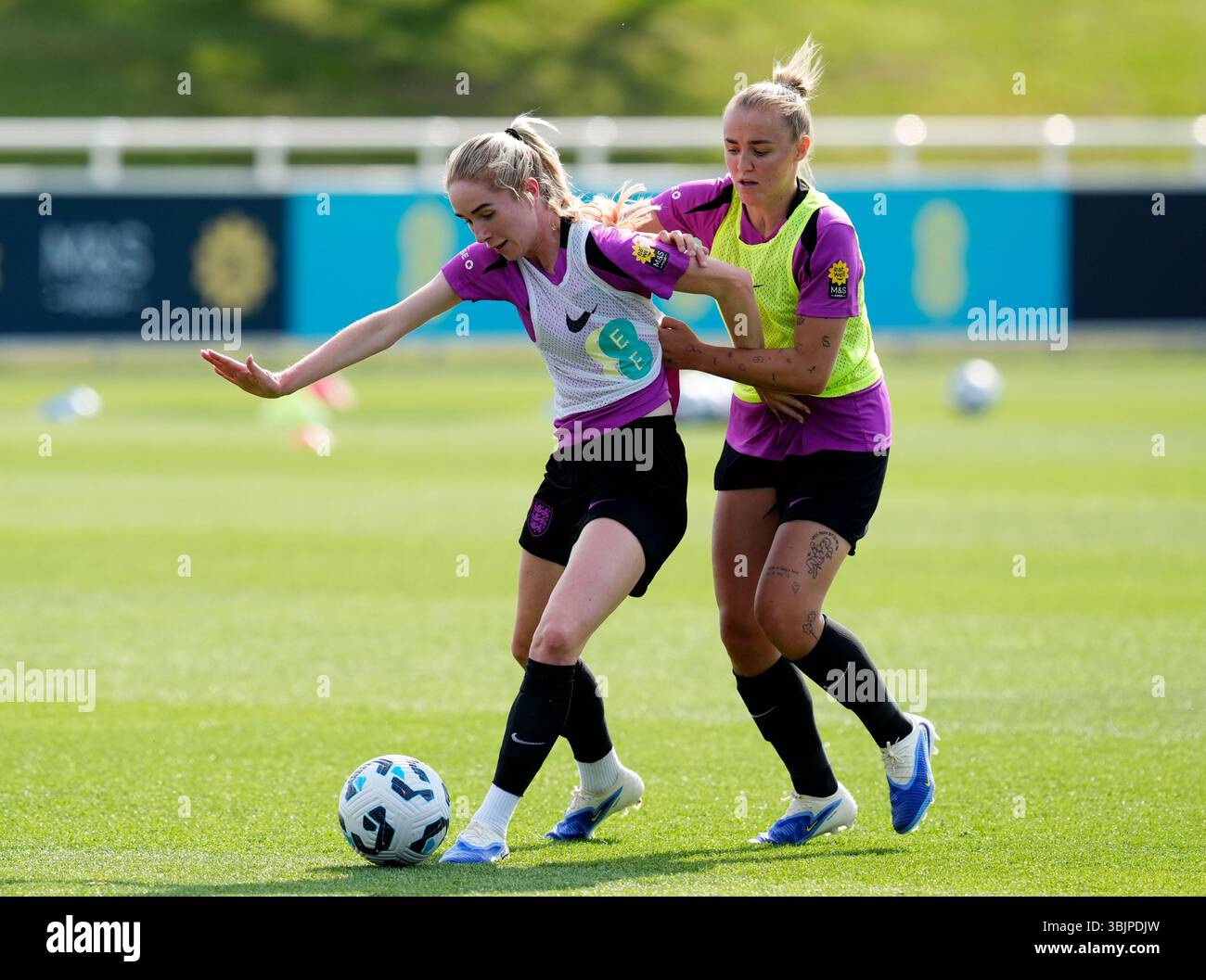 England's Missy Bo Kearns and Georgia Stanway during a training session at St George's Park ...