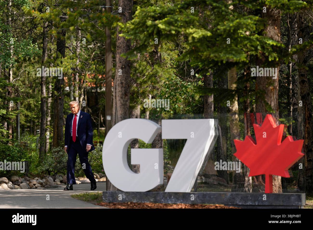 President Donald Trump arrives during the official welcome of the G7 ...