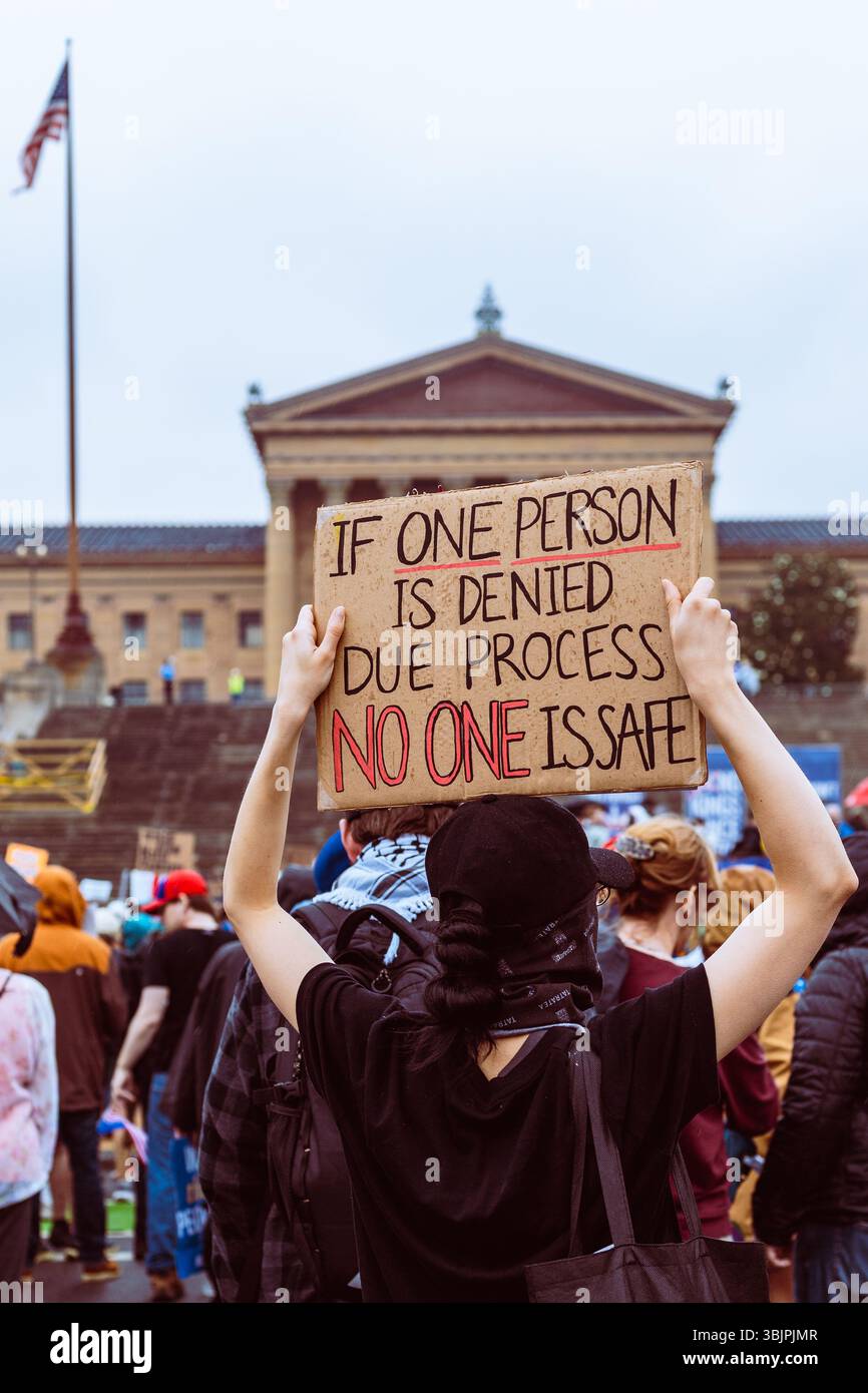 People stand up for immigrant rights in the No Kings Protest on June 14 ...