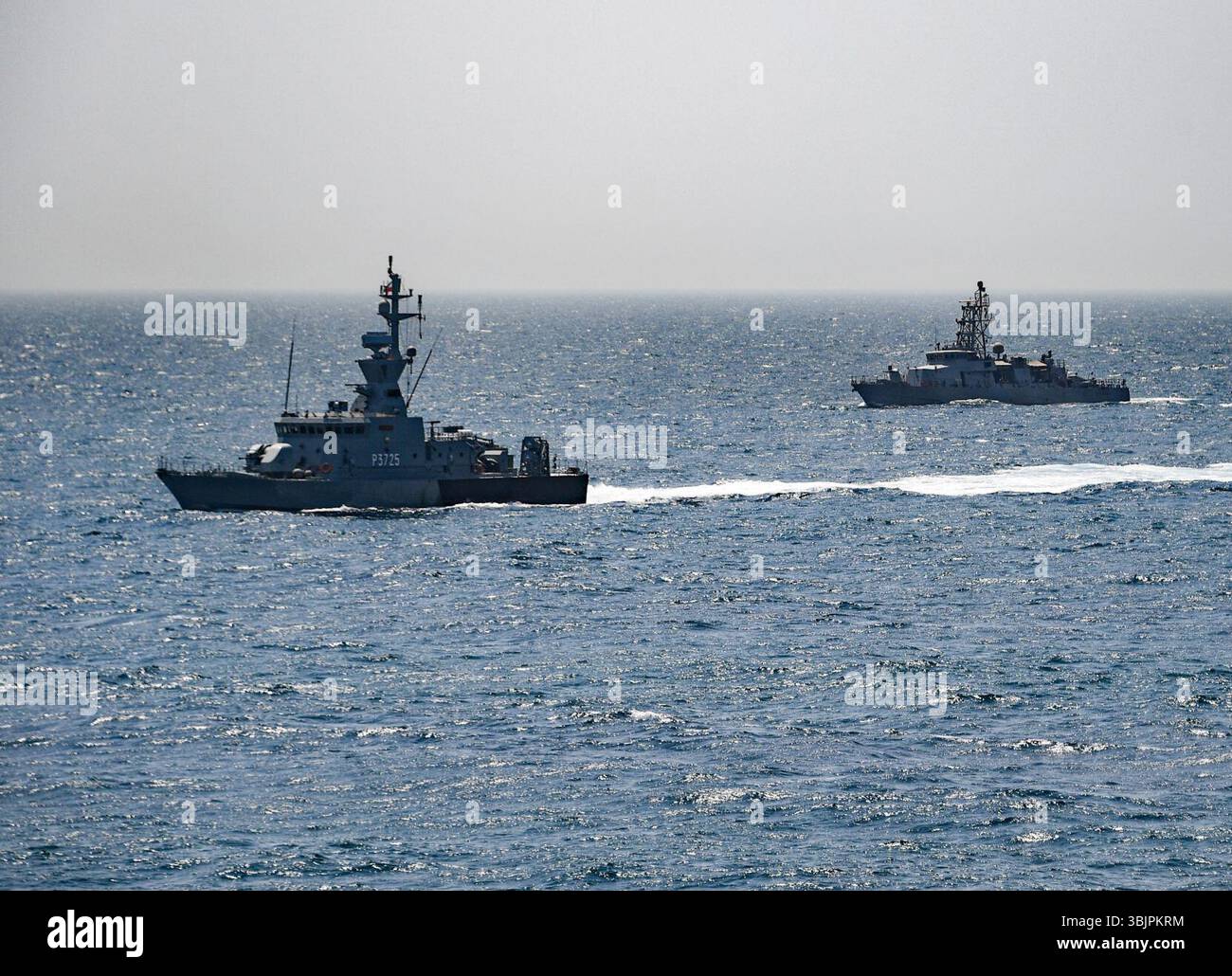 Kuwaiti navy patrol boat KNS Al-Garoh (P 3725) and coastal patrol ship ...