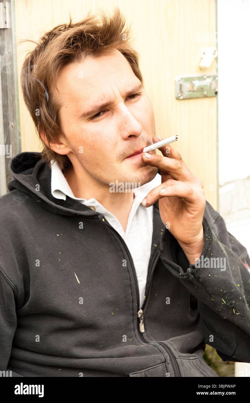 Poor guy hi-res stock photography and images - Alamy