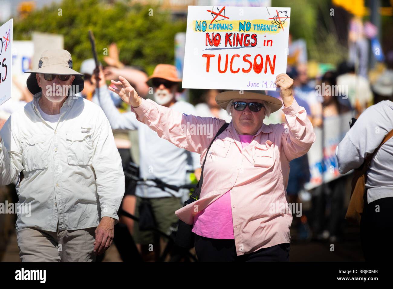 Protesters in Tucson, Arizona, rally on No King’s Day with signs ...
