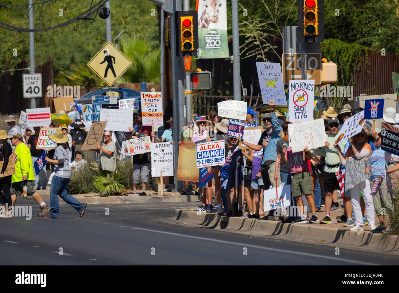 Protesters in Tucson, Arizona, rally on No King’s Day with signs ...