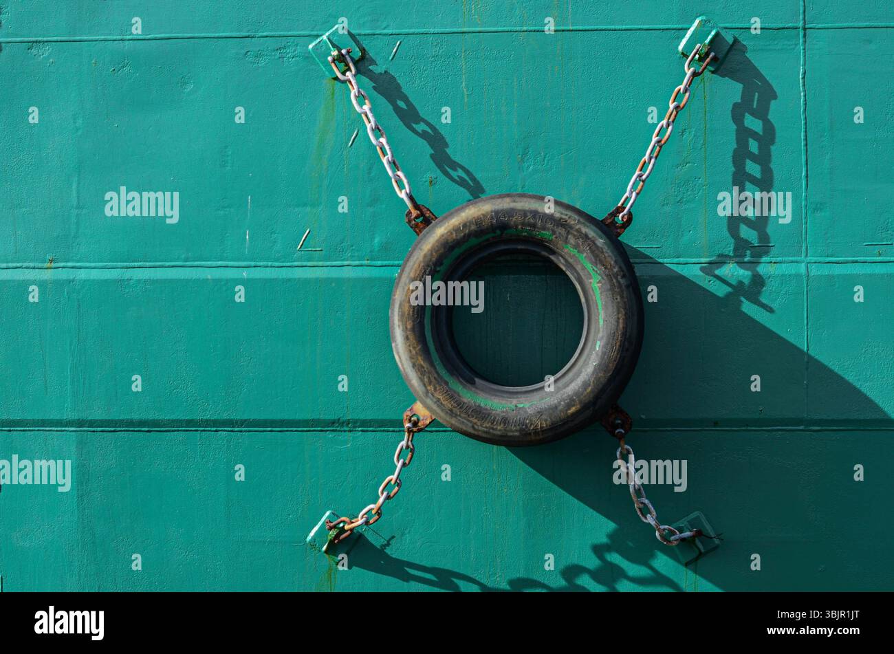 The fender installed on side of the offshore support vessel. It is a ...