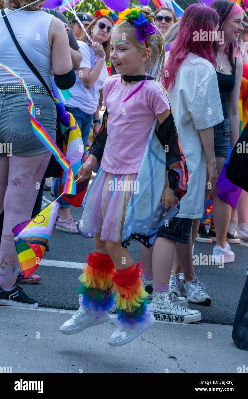 Participants marching during the Warsaw Pride parade in Warsaw ...