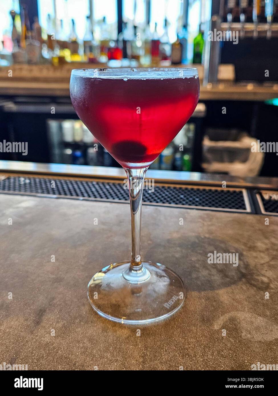 Manhattan straight up with cherry Stock Photo - Alamy