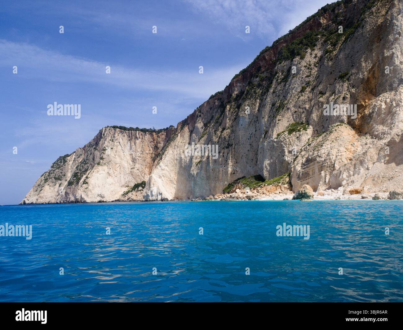 The scenic rocky coastline of Zante island with bright cliffs and soft ...