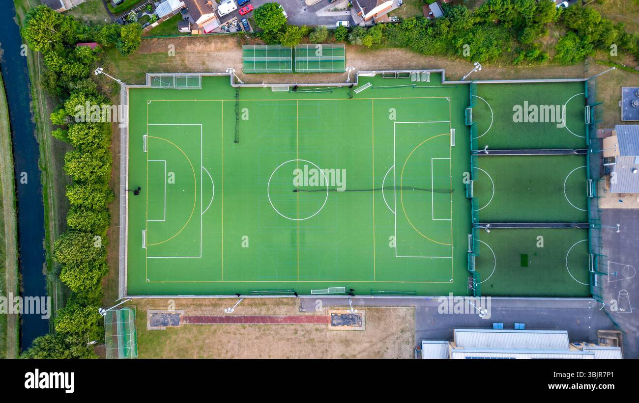 Top down aerial view of an empty football field, awaiting the joyous ...