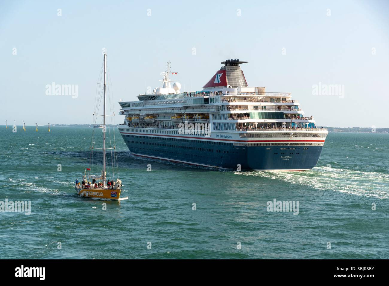 Small cruise boat passing away hi-res stock photography and images - Alamy