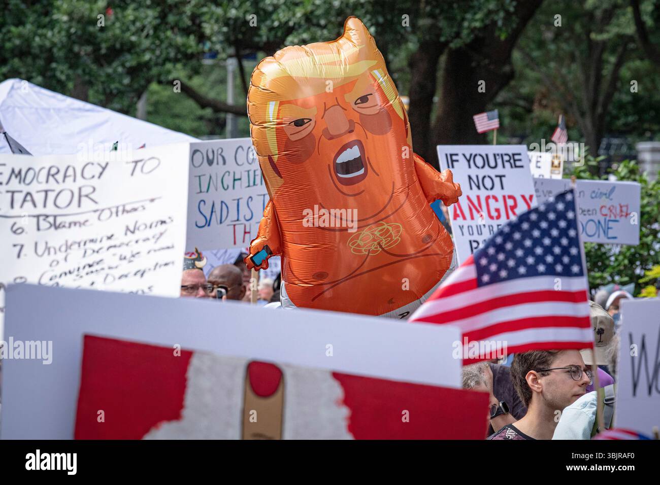 Houston, Texas, USA. 14th June, 2025. Protesters demonstrating against ...