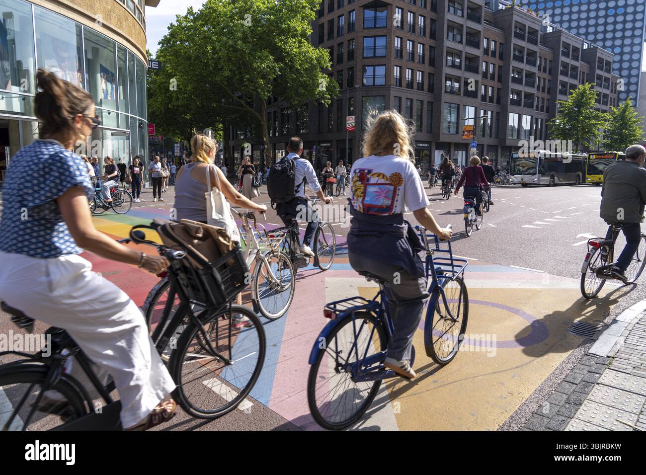Central cycle path along the Vredenburg, in the city centre of Utrecht ...