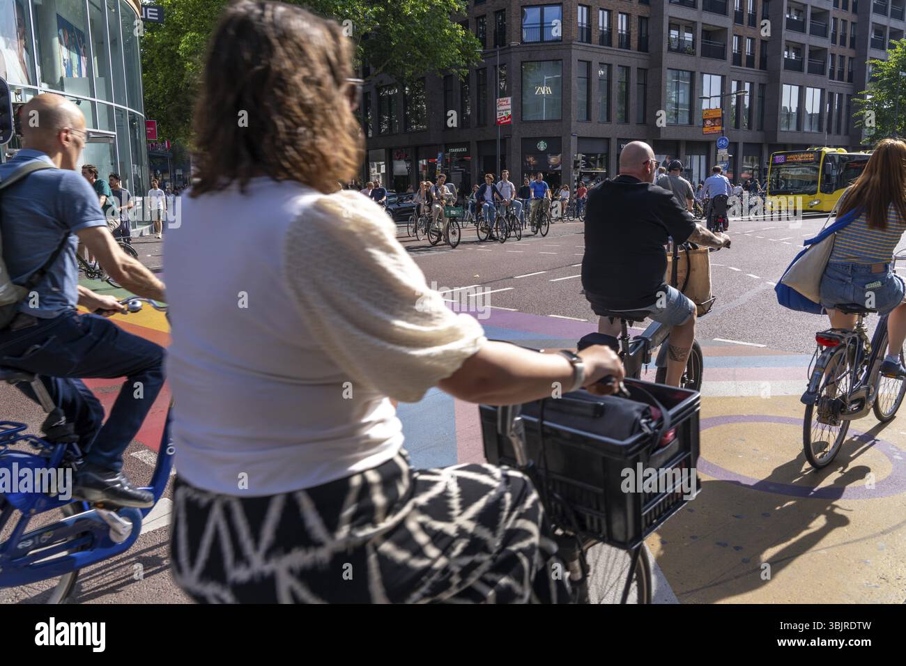 Central cycle path along the Vredenburg, in the city centre of Utrecht ...