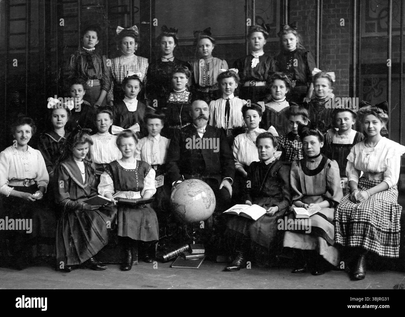 Girls class globe, 1930s, Group photo of a school class with teacher ...