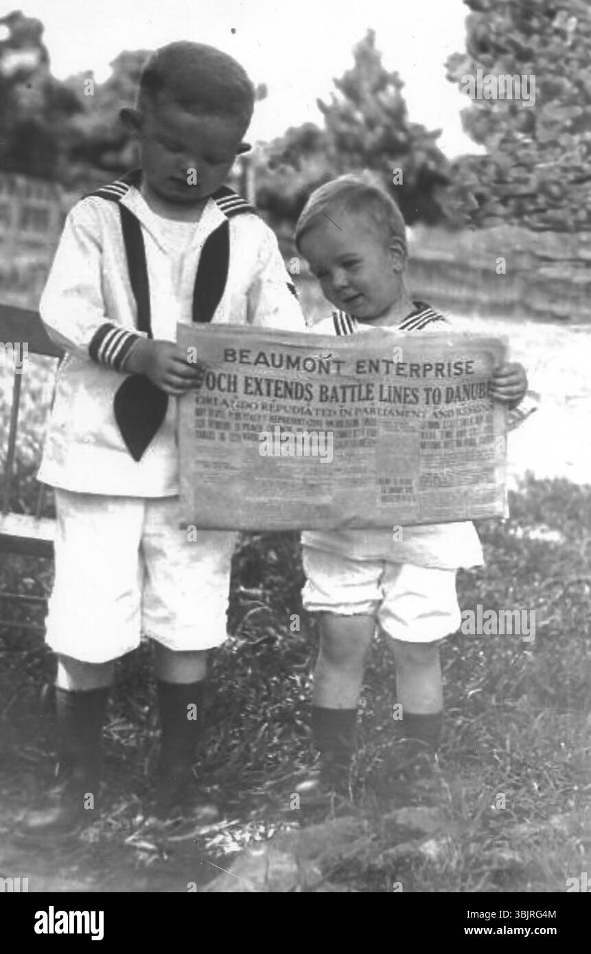 Two children reading a newspaper, First World War, 1910s, Two children ...